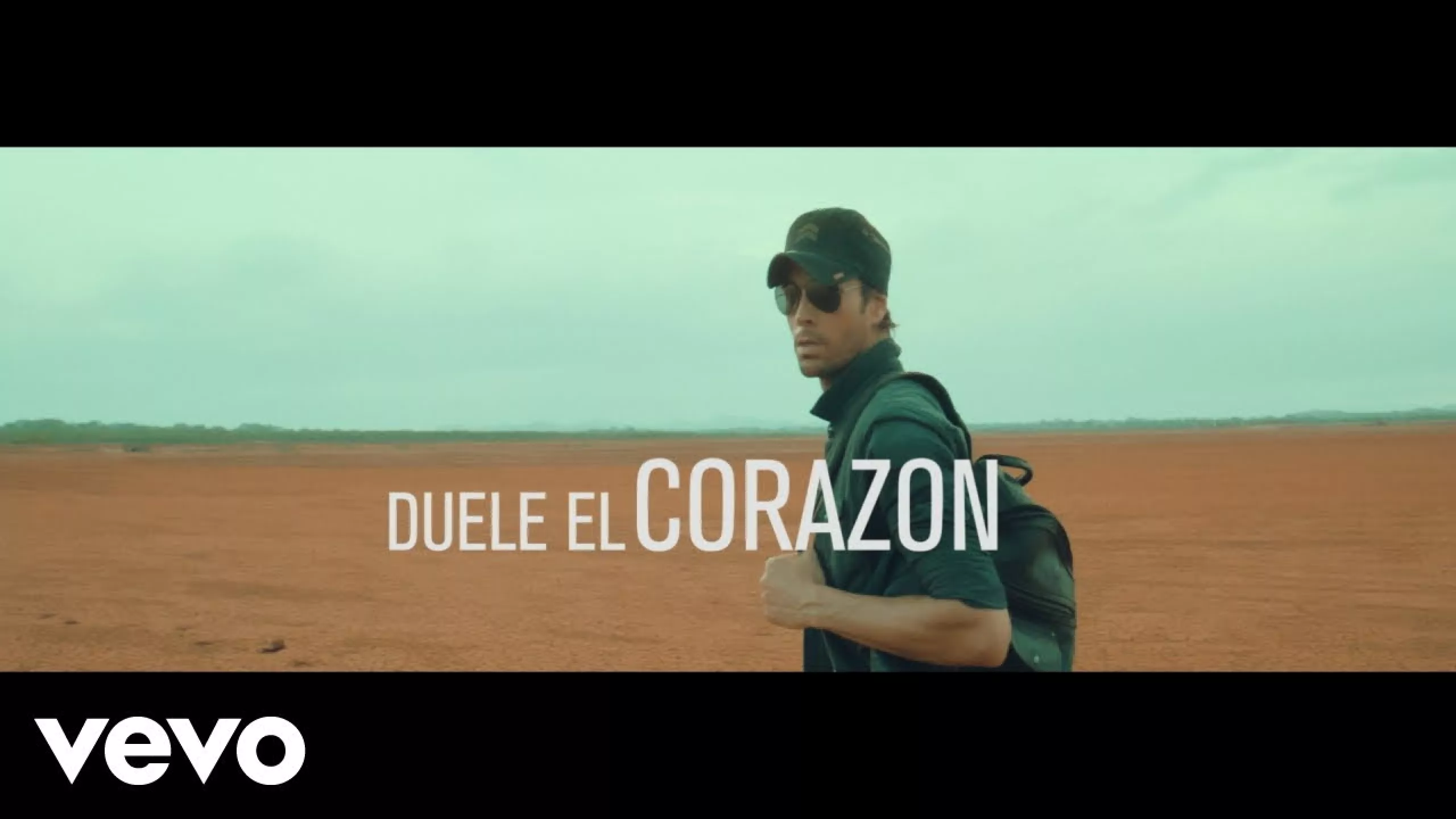 Enrique Iglesias - DUELE EL CORAZON ft. Wisin: Clothes, Outfits, Brands ...