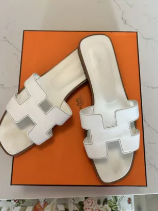 Hermès - White Oran H Flat Sandals