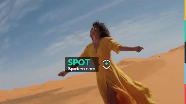 The yellow dress with ruffles of TAL in the video World | Spotern