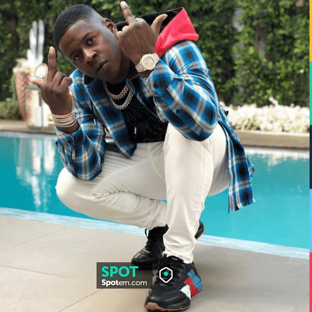 The sneakers striped Gucci of Committee Youngsta on his account ...