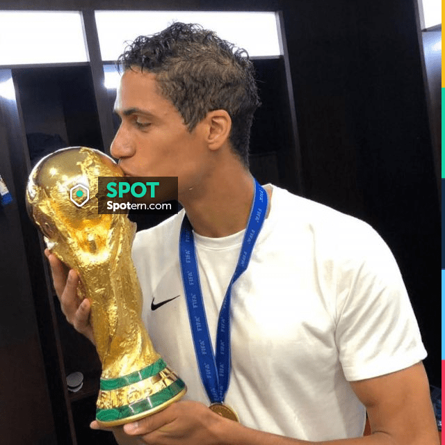 The trophy of the World Cup 2018 being kissed by Raphael Varane on his ...