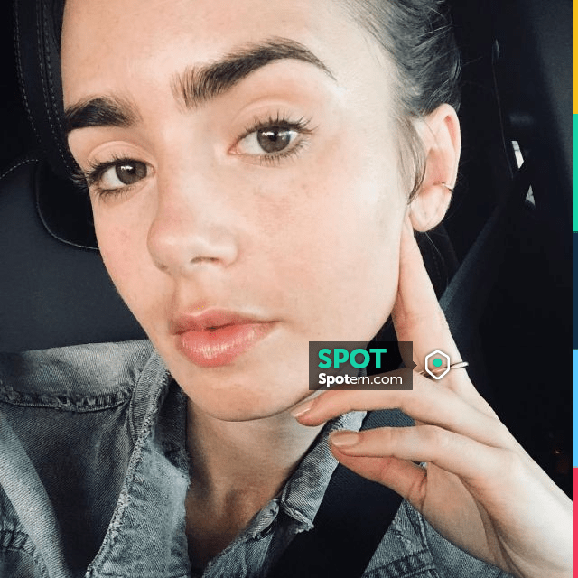 The gold ring view on the account Instagram of Lily Collins | Spotern