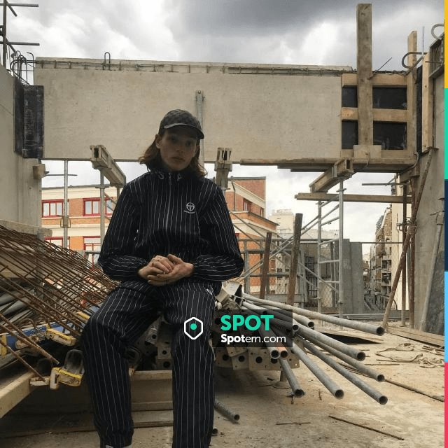 The tracksuit black striped Sergio Tacchini Lorenzo Pioli on the ...