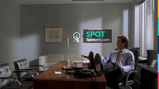 The lamp on the desk of Patrick Bateman (Christian Bale) in American ...