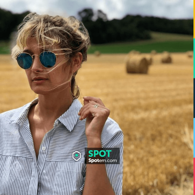 The striped shirt short sleeves worn by Caroline Anglade on his account ...