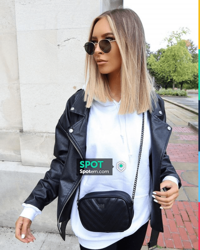 Suéter blanco de Alexx Coll en la cuenta de Instagram @alexxcoll | Spotern