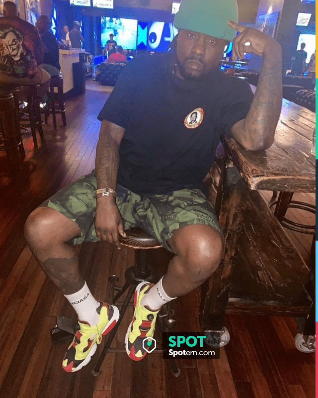Sneakers reebok black, yellow, red and white worn by Wale on the ...