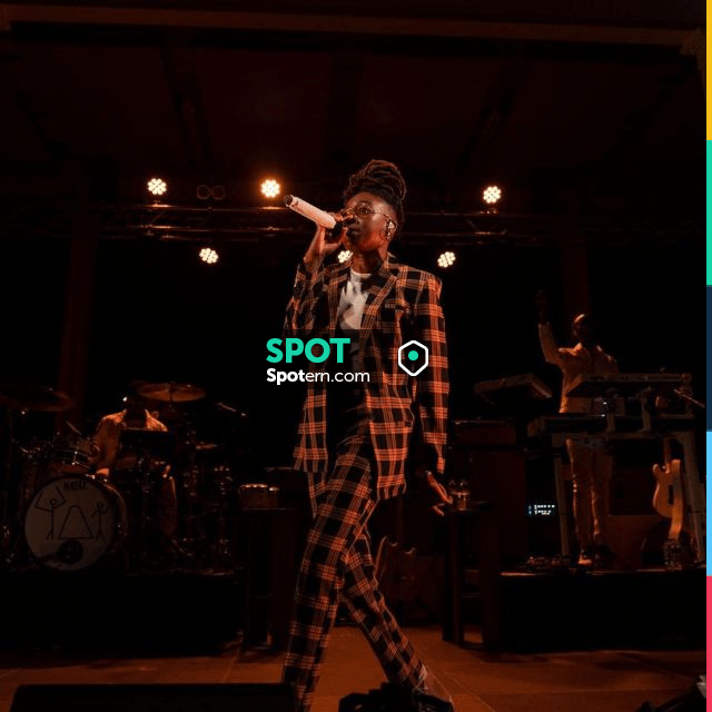 The black blazer with red squares worn by Little Simz on the account ...