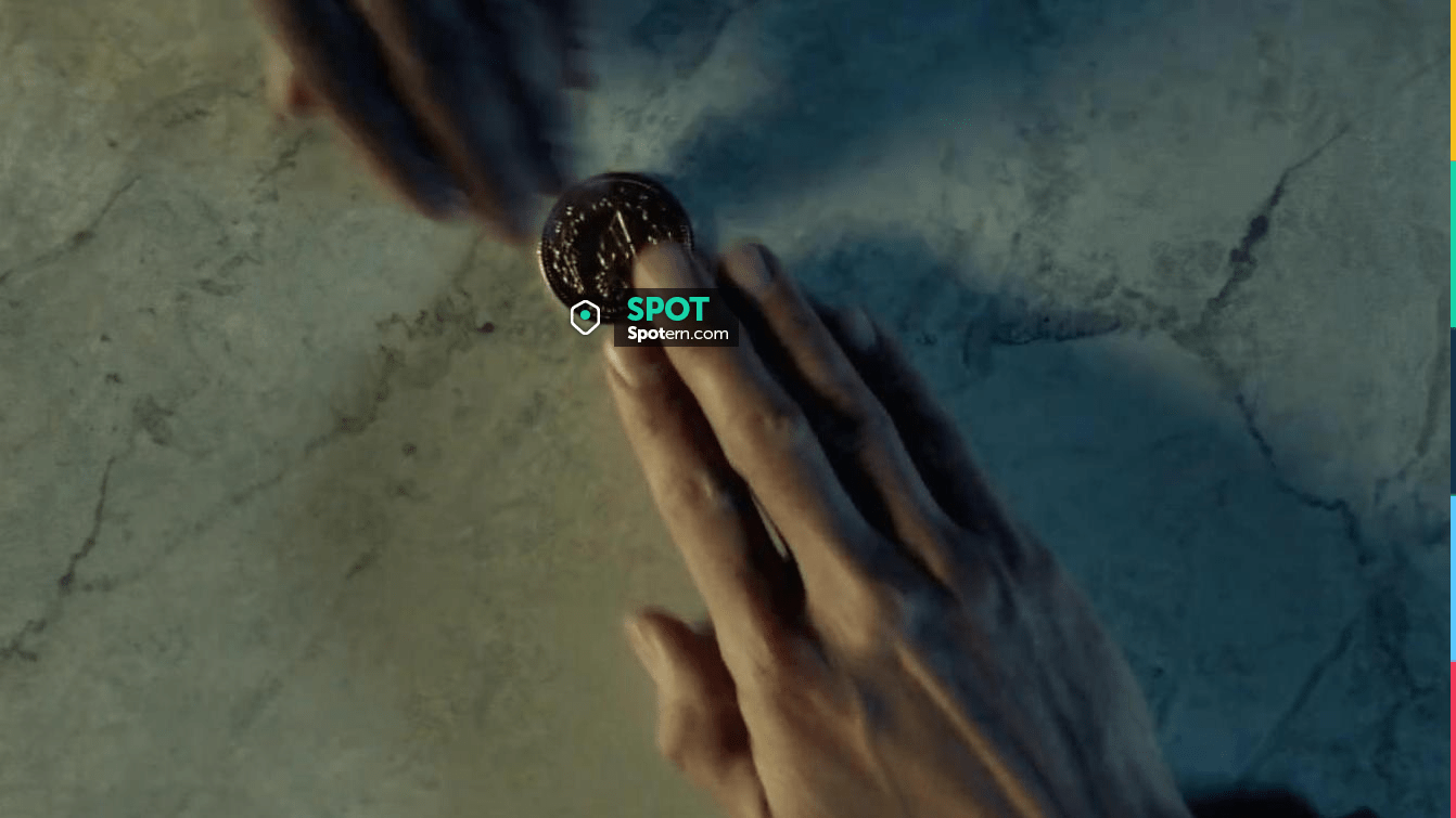 The Continental coin used by John Wick (Keanu Reeves) in the movie John ...