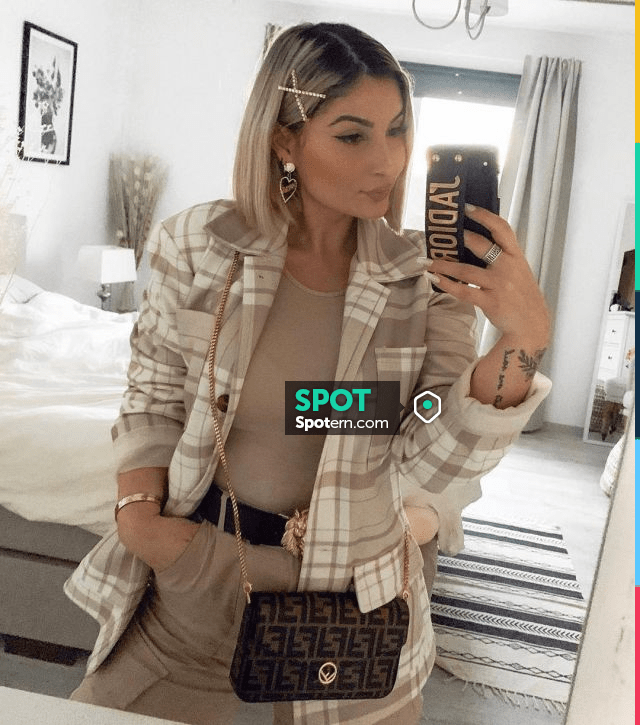 La veste à carreaux de Lufy sur le compte Instagram de @lufyyyy | Spotern