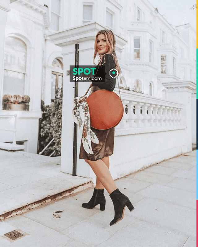 Suéter de cuello de tortuga de Erica Aulds en la cuenta de Instagram ...