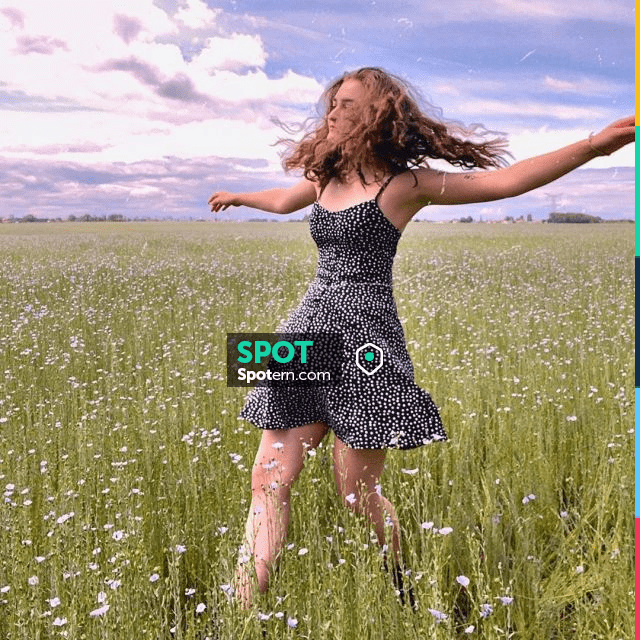 The black dress with white polka dots worn by Esile on his account ...