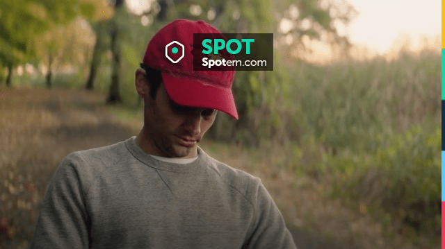 The red cap worn by Joe Goldberg (Penn Badgley) in the series YOU ...