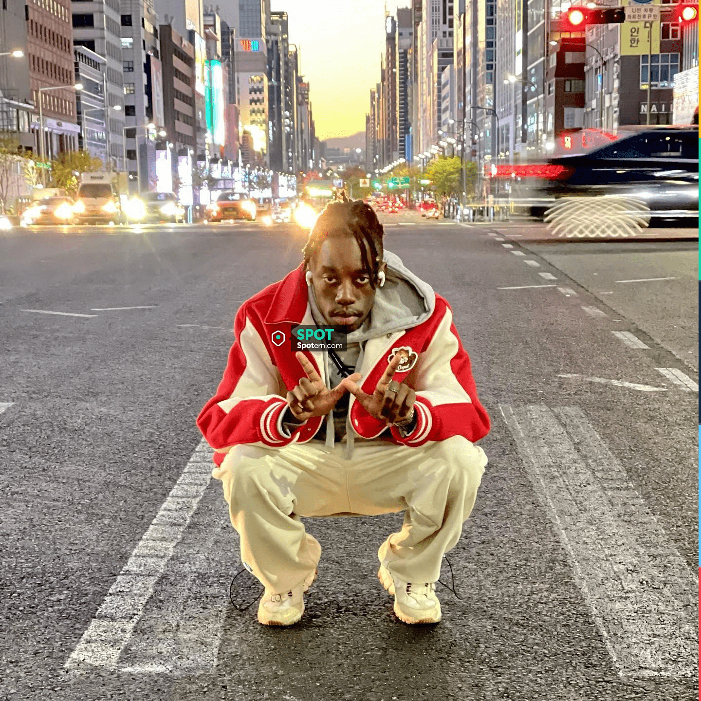 The red and white Coquet Studio university jacket worn by Moha on his ...