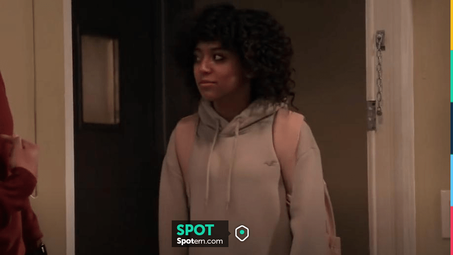 Hollister Re­laxed Icon Hood­ie worn by Katie (Kiarra Beasley) as seen in Extended Family ...