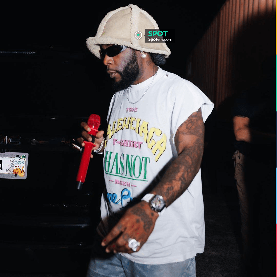 Acne Studios Beige Shear­ling Buck­et Hat worn by Burna Boy on the ...