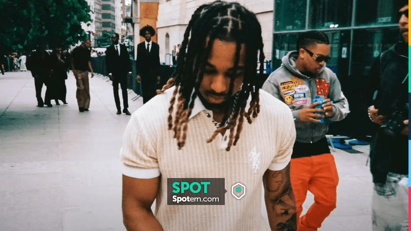 Amiri Cream Staggered Logo Polo worn by DDG in DDG - She Ain't Leaving ...