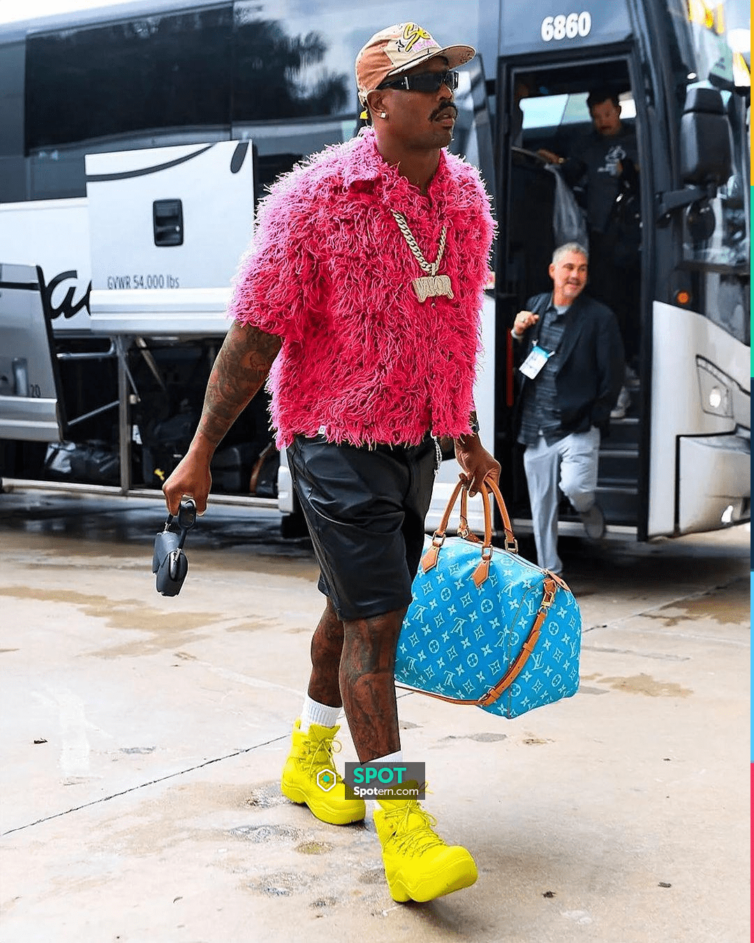 Bottega Veneta Acid Yellow Puddle Bomber Boots worn by Von Miller on the Instagram account ...