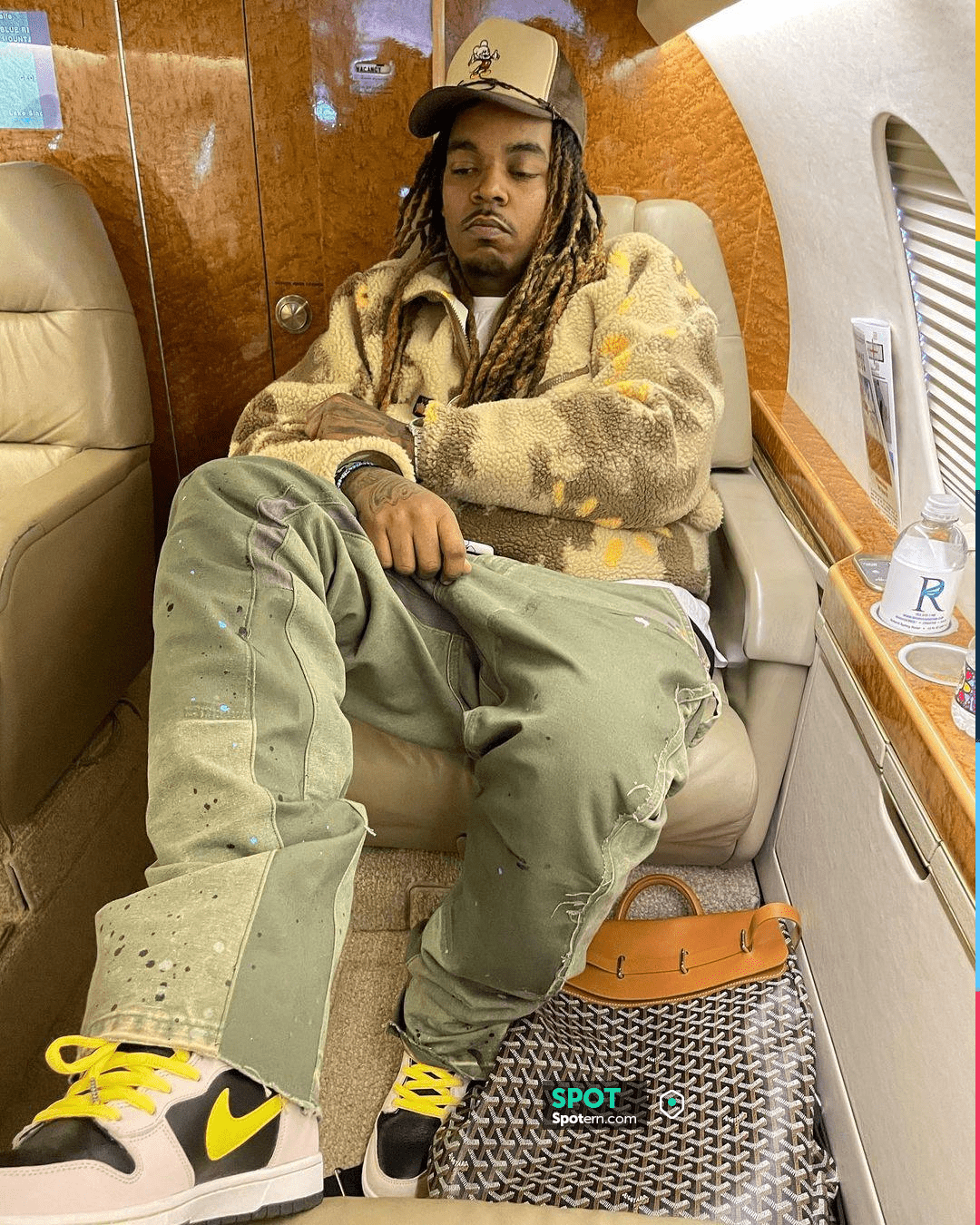 Goyard Black & Brown Trim Steamer Backpack worn by Wheezy on the ...