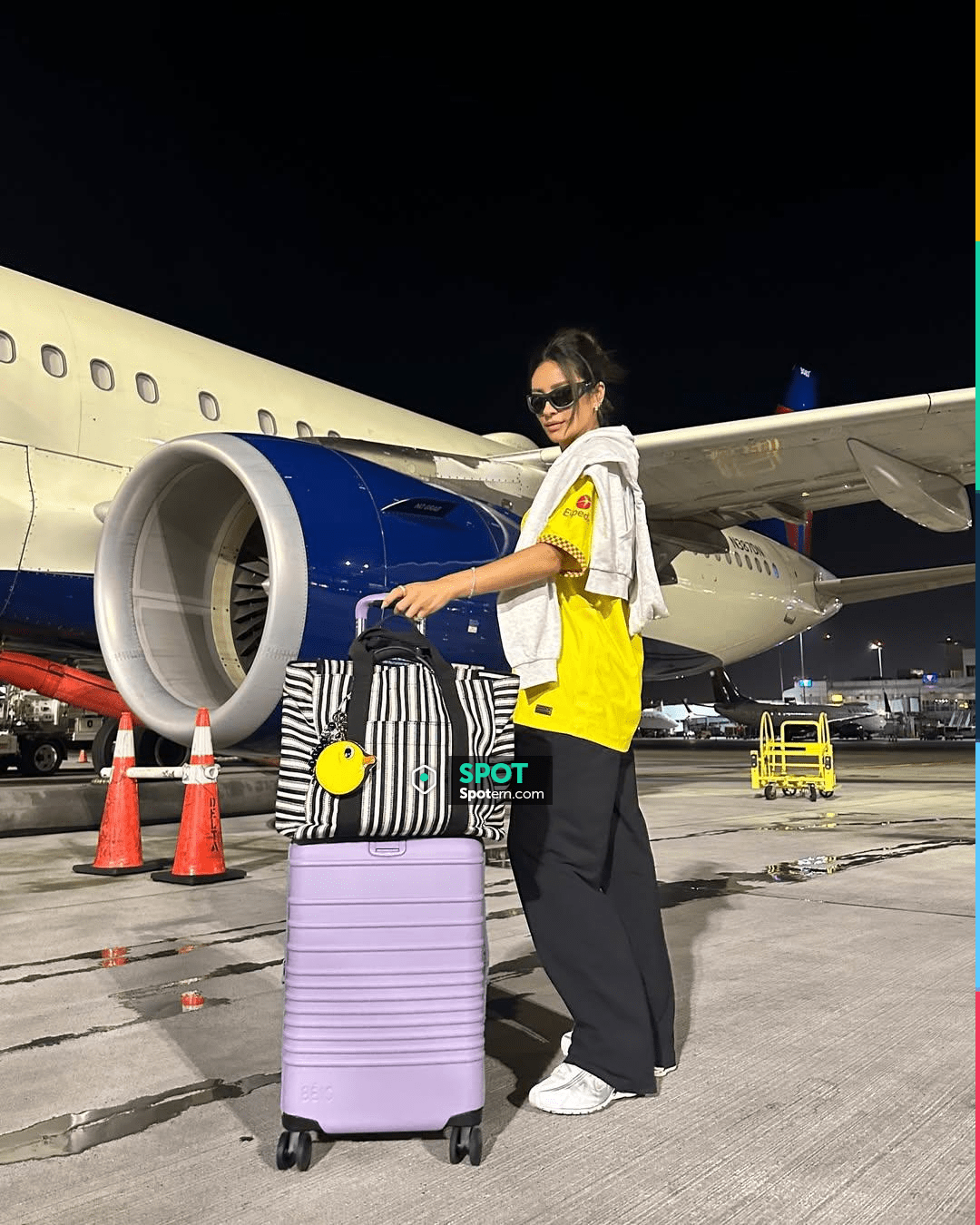 Beis the Vacation Tote in Black Stripe worn by Shay Mitchell on her ...