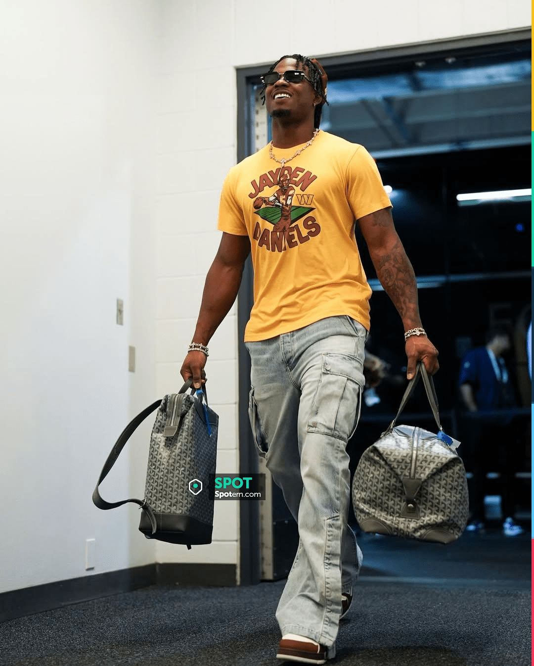 Goyard Grey Cisalpin Backpack worn by Brian Robinson Jr. on the ...