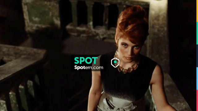 The collar of Strawberry Fields (Gemma Arterton) in Quantum of Solace ...