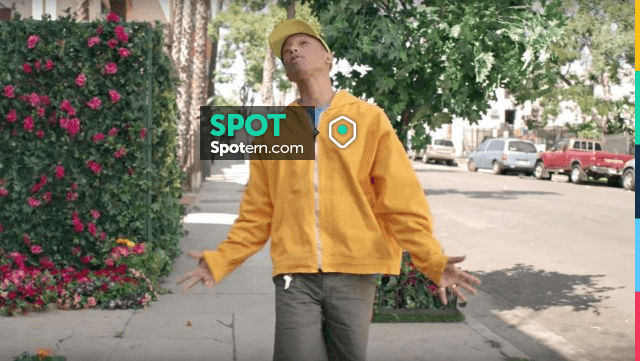 The windproof yellow Pharell Williams in his Clip to Yellow Light | Spotern