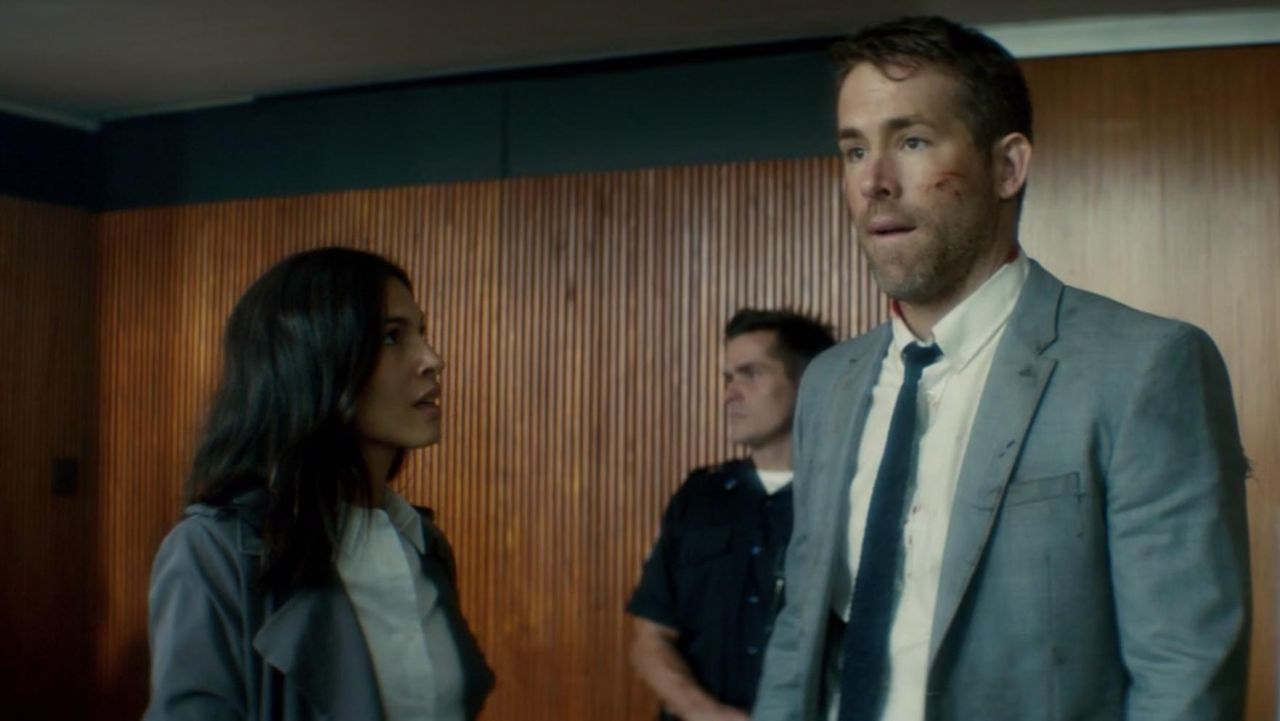 The trench coat grey Zara of Amelia Roussel (Elodie Yung) in Hitman ...