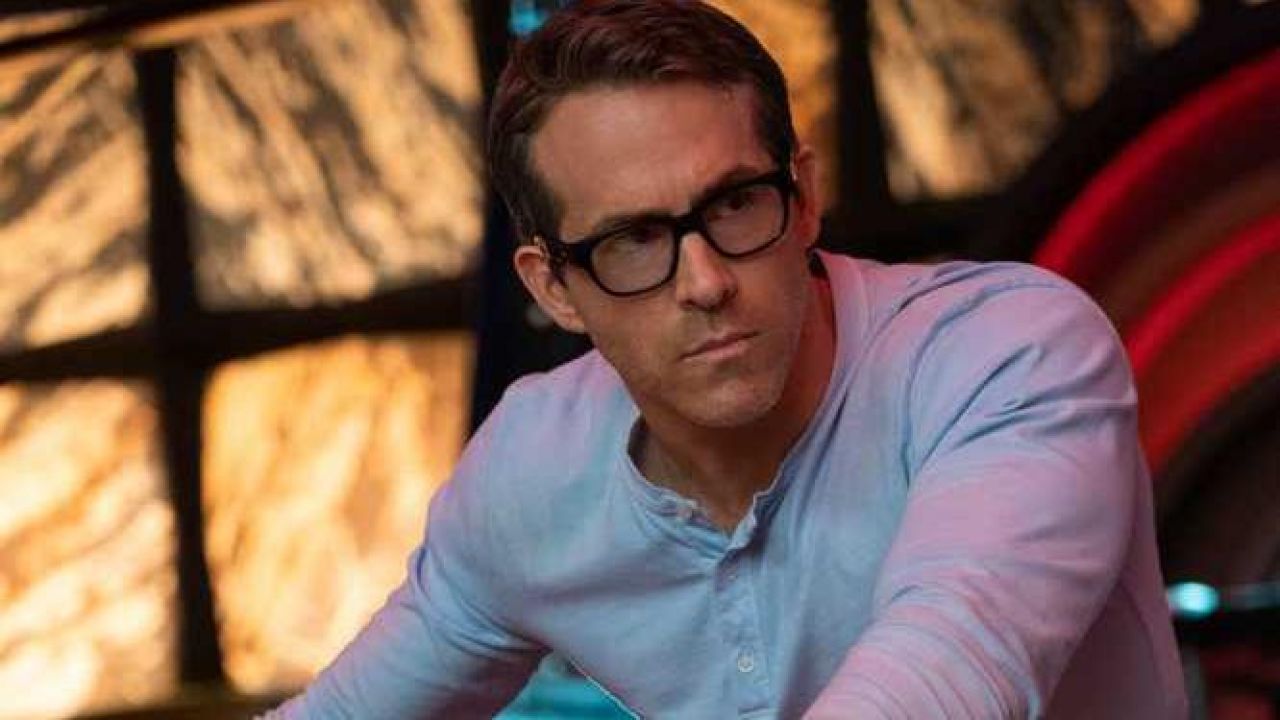 Sky Blue Henley Shirt worn by Guy (Ryan Reynolds) in Free Guy | Spotern