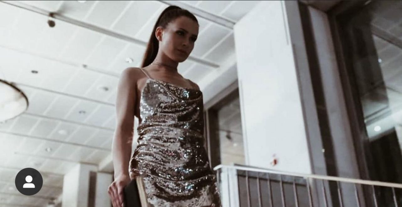 The short dress with sequins, silver with cowl neck worn by Laura Biel ...