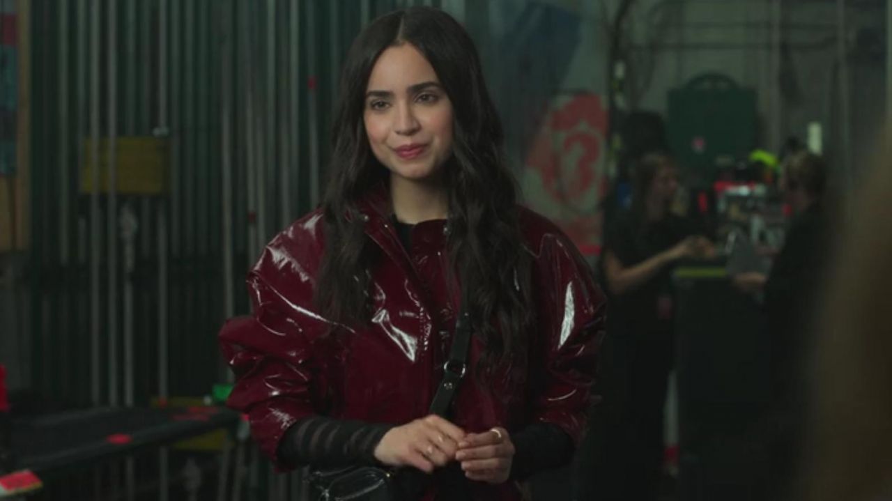 The jacket vinyl short cerise scope by April (Sofia Carson) in Feel the ...