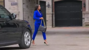 Chanel Jum­bo Dou­ble Flap Shoul­der Bag worn by Odeen Eccleston as ...