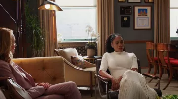 Lola Carmichael (played by Simone Missick) outfits on All Rise