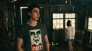 Purple polo shirt worn by Clay (Ethan Hawke) as seen in Leave the World ...