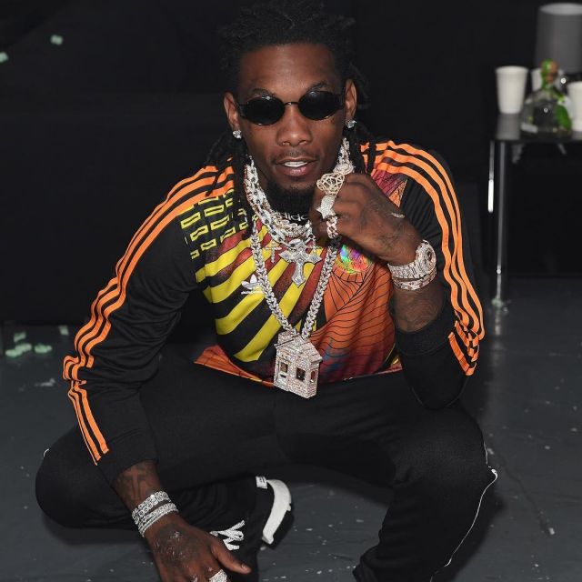 The watch is silver and Takeoff on the account instagram @migos | Spotern