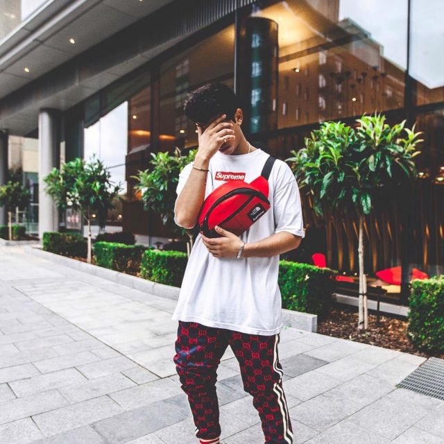 The lumbar pack Supreme x TNF red that is on the influencer and ...