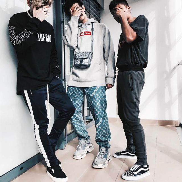 The Balenciaga Triple S grey what does the influencer John Melchico ...