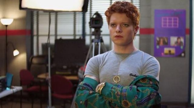 Grey "Babygirl" T-shirt worn by Heather Duke (Brendan Scannell) as seen ...