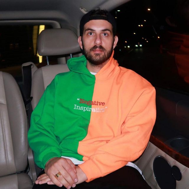 The hoodie green and orange worn by Borgore on the account Instagram of ...