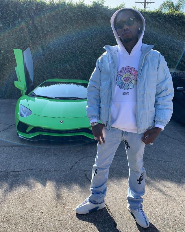 The hoodie is white with flower, multi-colored worn by Offset account ...