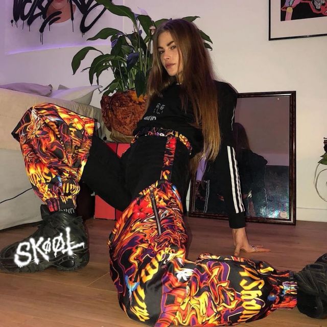The Skoot flame print jumpsuit worn by a model on @skoot_apparel's ...