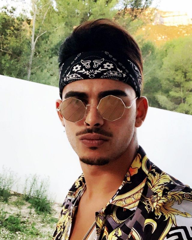 Bandana black worn by Greg Yega on his account Instagram @greg_yega ...