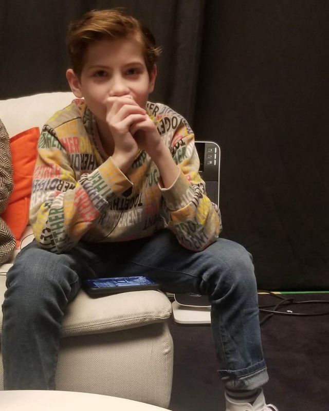 The sweatshirt is yellow with writing by Jacob Tremblay on his account ...