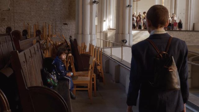 The leather backpack black and brown and Esther Shapiro (Shira Haas) in ...