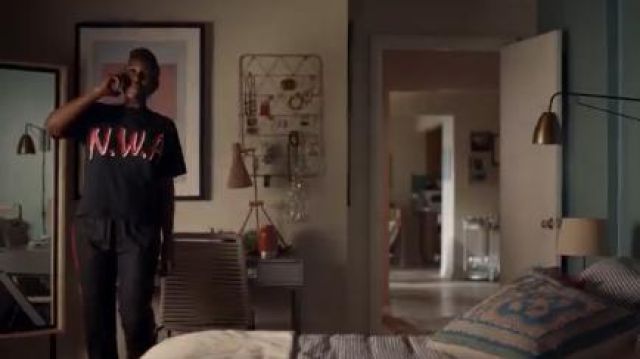 Black Graph­ic T-Shirt worn by Issa Dee (Issa Rae) in Insecure Season 4 ...