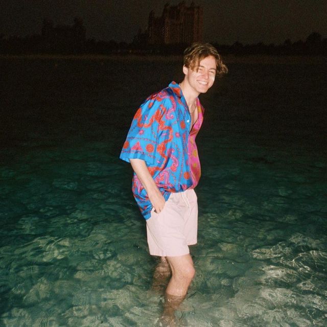 The sleeve baroque-print Versace worn by Nick Austin on his account ...