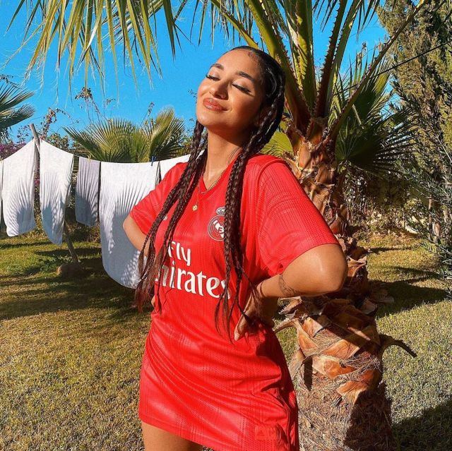 The football shirt red Real Madrid worn by Maile Akln on his account ...