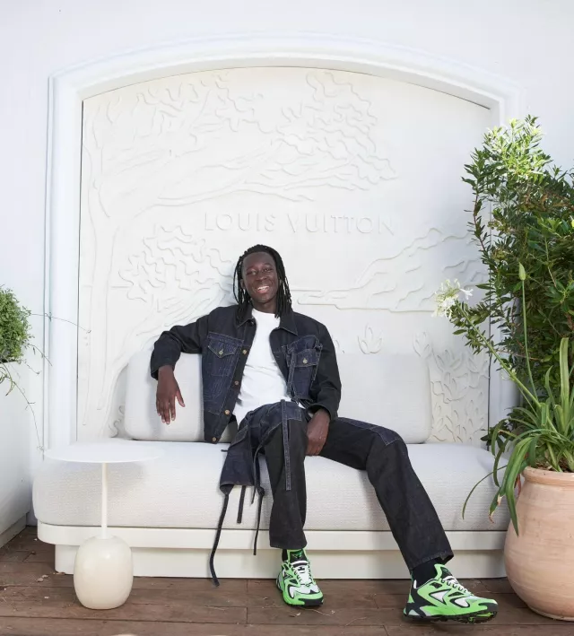The pair of Louis Vuitton Runner Tatic sneakers in green worn by Mory ...
