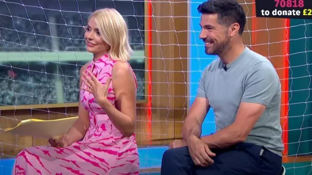 Mercy delta Pen­rose Long­wing Rose Dress worn by Holly Willoughby as ...