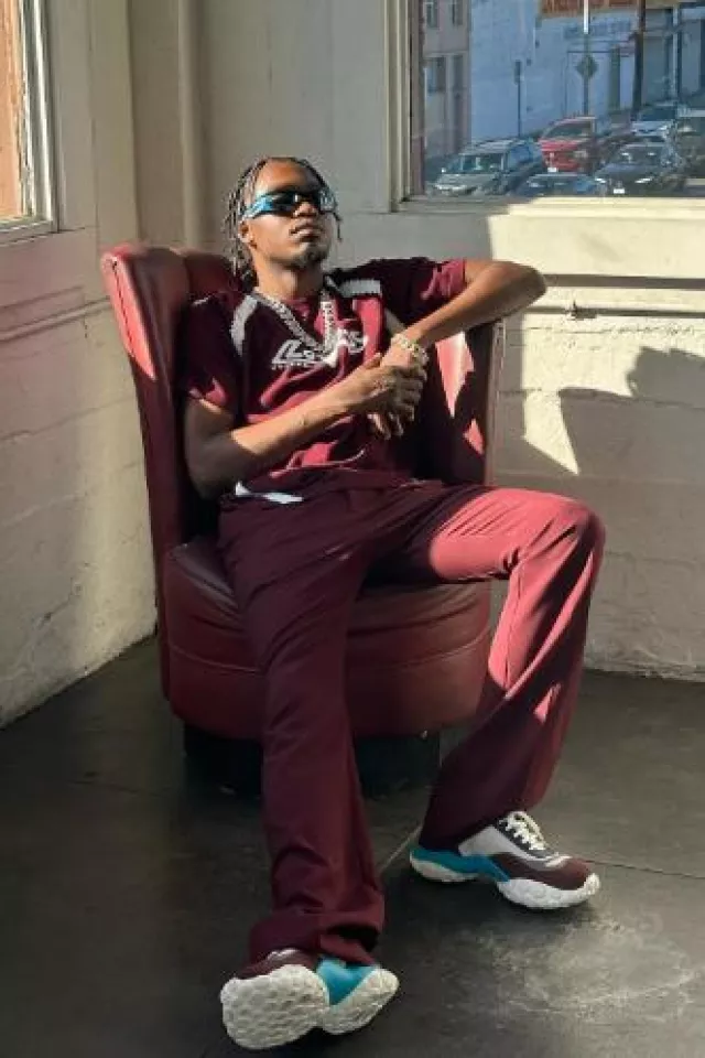 Bottega Veneta Blue & Black Can­gi Wrap Sun­glass­es worn by Lil Tjay ...